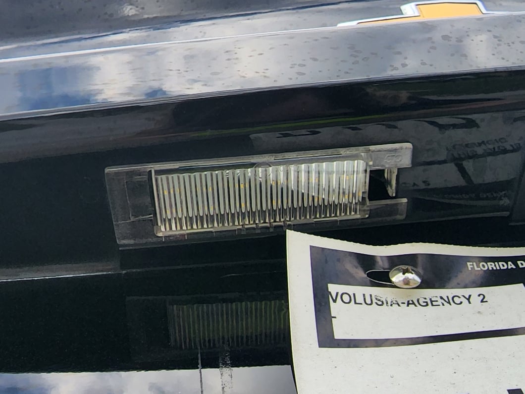 Raxiom Axial Series LED License Plate Lamps (14-17 Camaro) | Raxiom